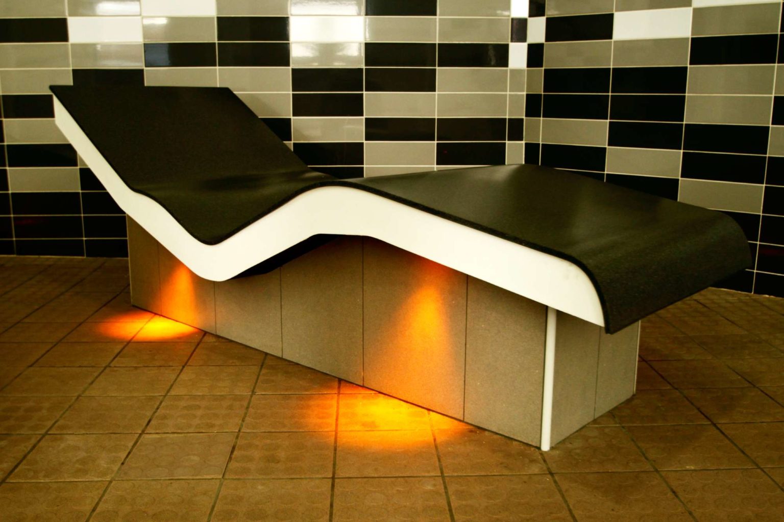 Heated Loungers | Topline Pools and Wellness