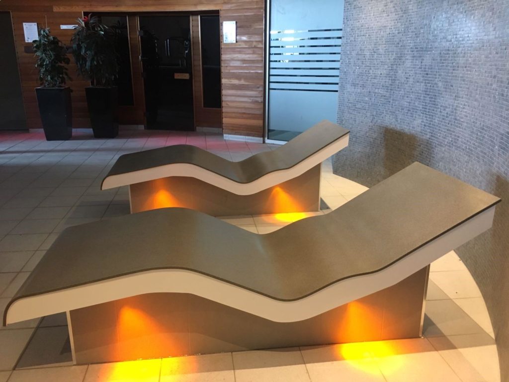 Heated Loungers | Topline Pools and Wellness